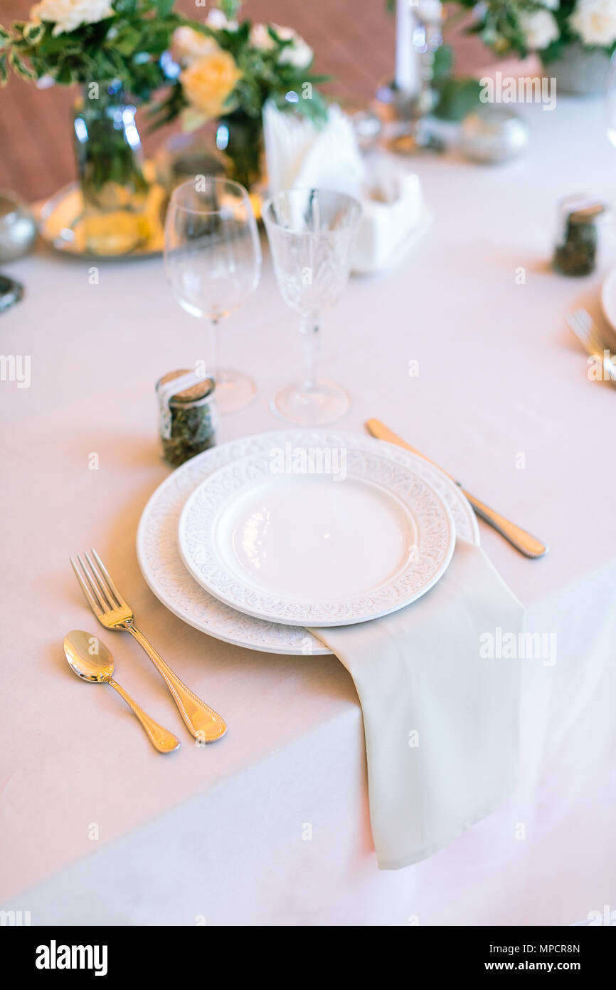 feast, celebration, event concept. close up of table setting , served ...