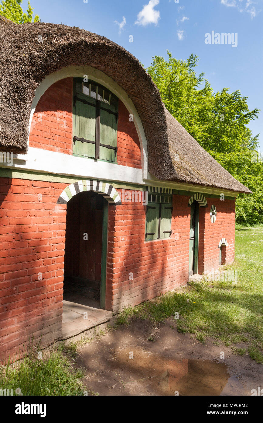 Red brick barn at the Folk Museum: A substantial red brick thatched ...