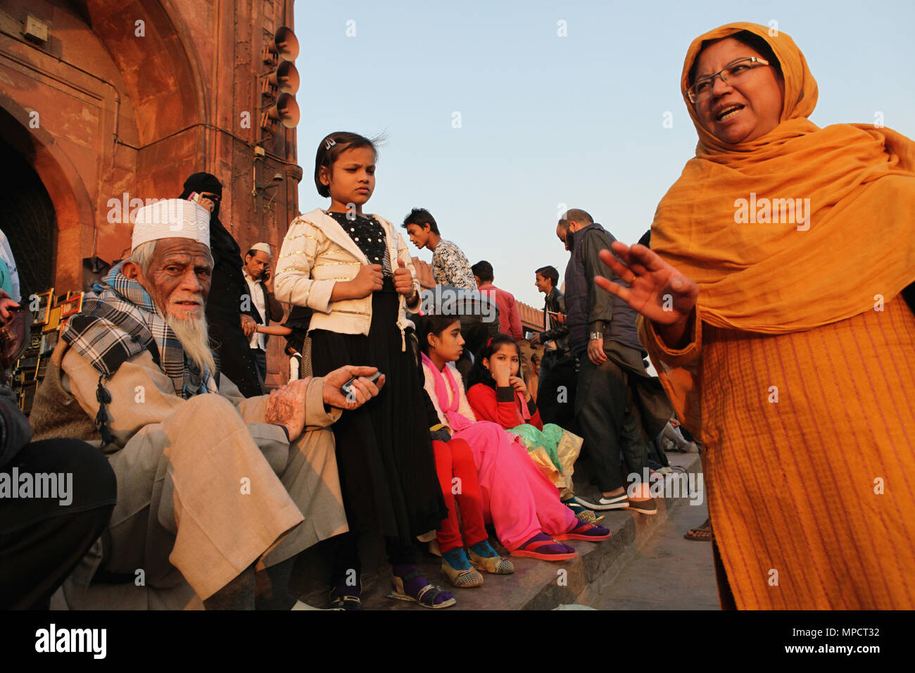 India, New Delhi, Muslim pilgrims at the entrance to the Jama Masjid in ...