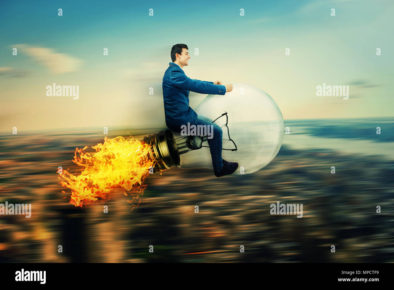 Happy businessman drive on a flying light bulb rocket, lamp with fire ...