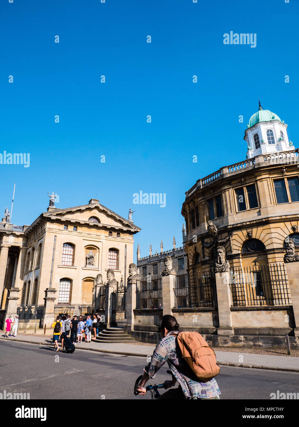 Tourists outside, Clarendon Building, and The Sheldonian Theatre ...