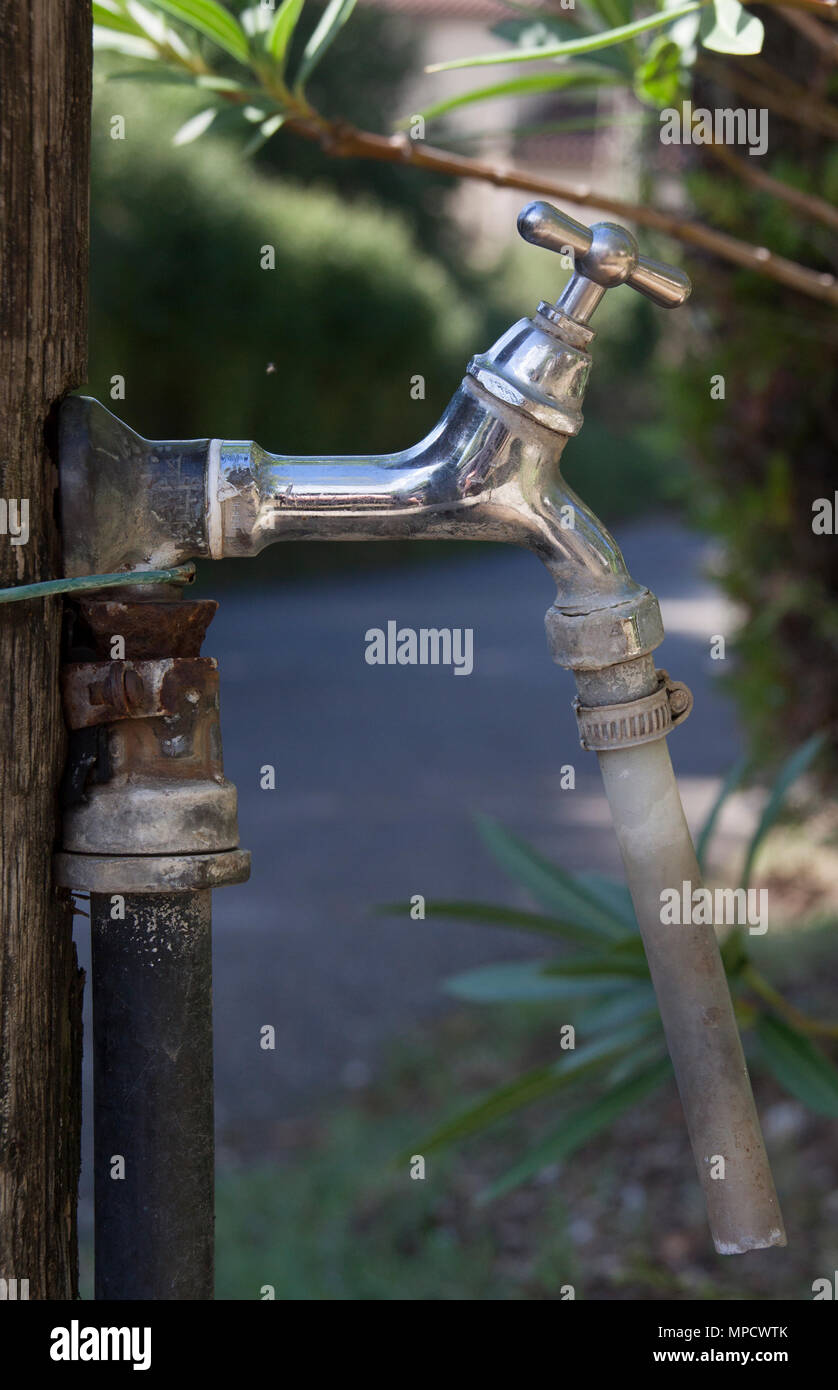 Outdoor water tap hi-res stock photography and images - Alamy