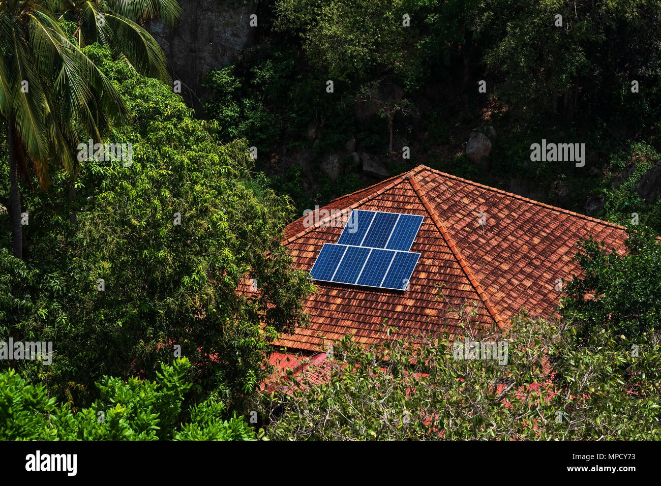 Roof with solar panels fragment in the forest Stock Photo - Alamy