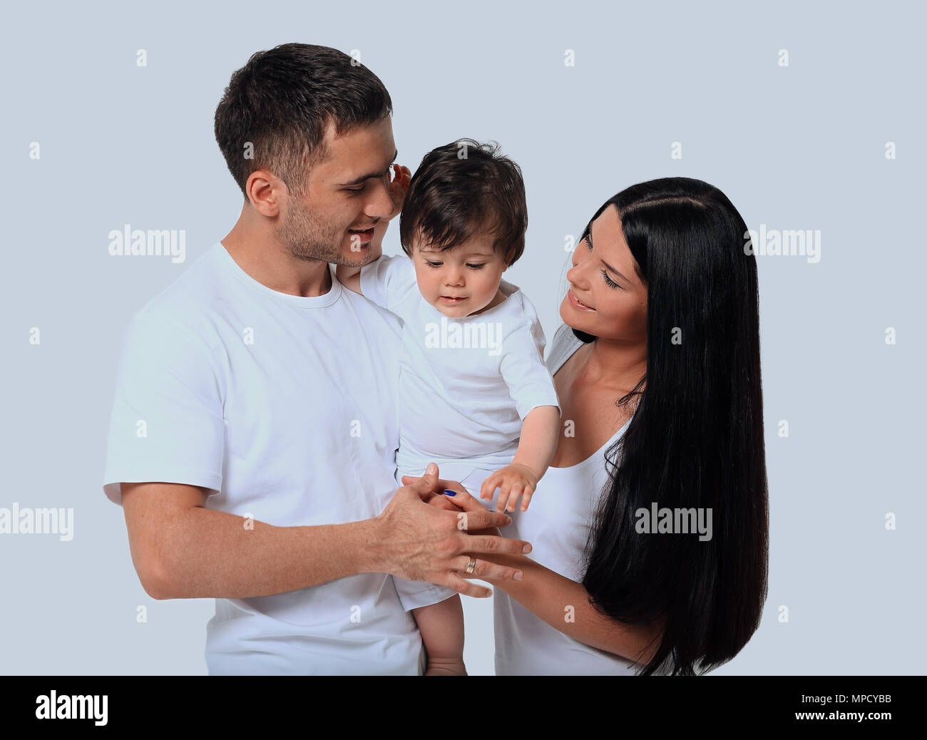 Happy family with newborn baby on a white background Stock Photo - Alamy