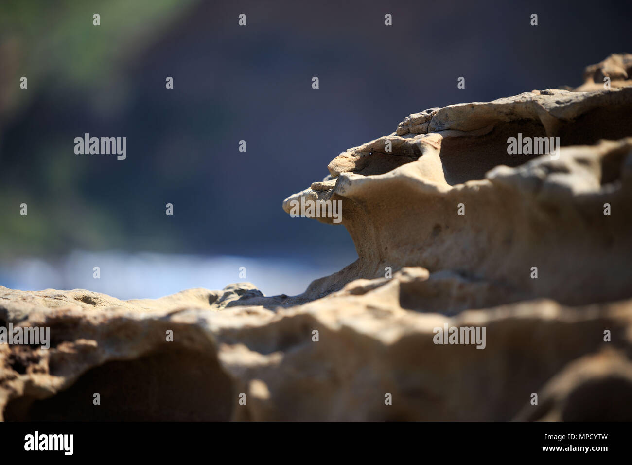 Coastal erosion leaves unusual shapes on seaside cliffs Stock Photo - Alamy