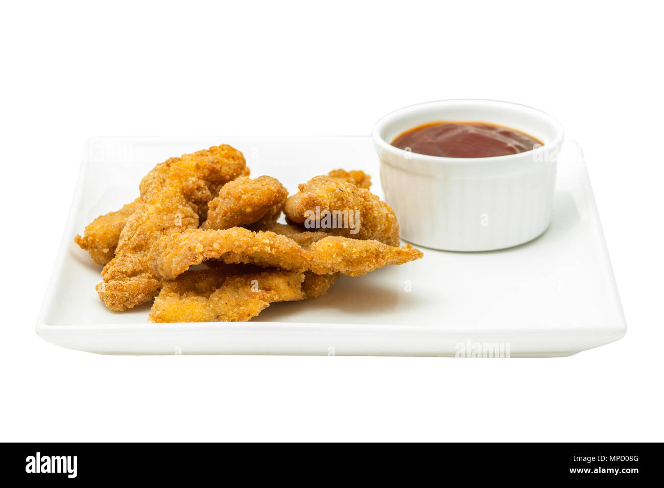 Chicken nuggets with ketchup on a square plate Stock Photo - Alamy