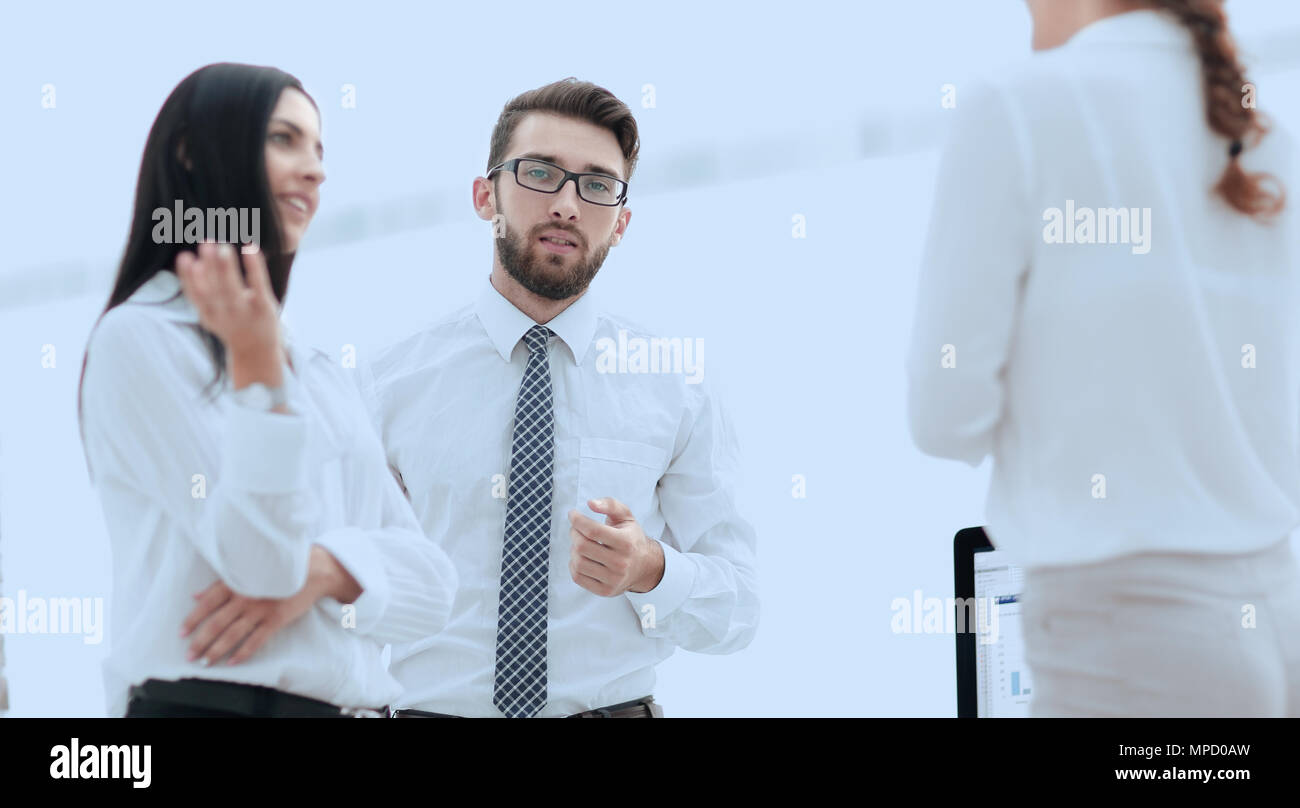 company employees are talking in the office Stock Photo - Alamy