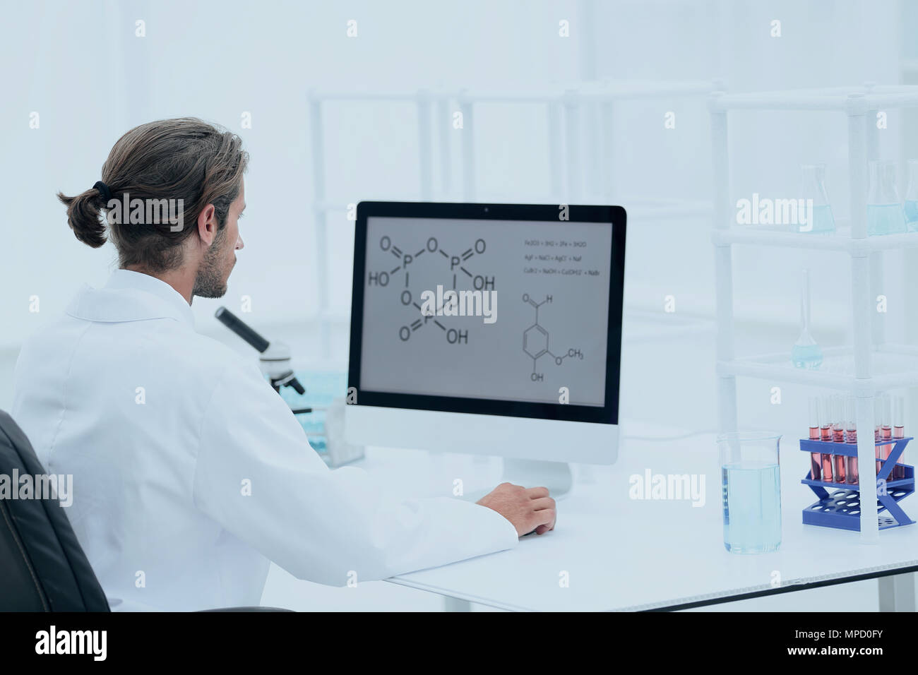 research scientist using computer chemistry laboratory Stock Photo - Alamy