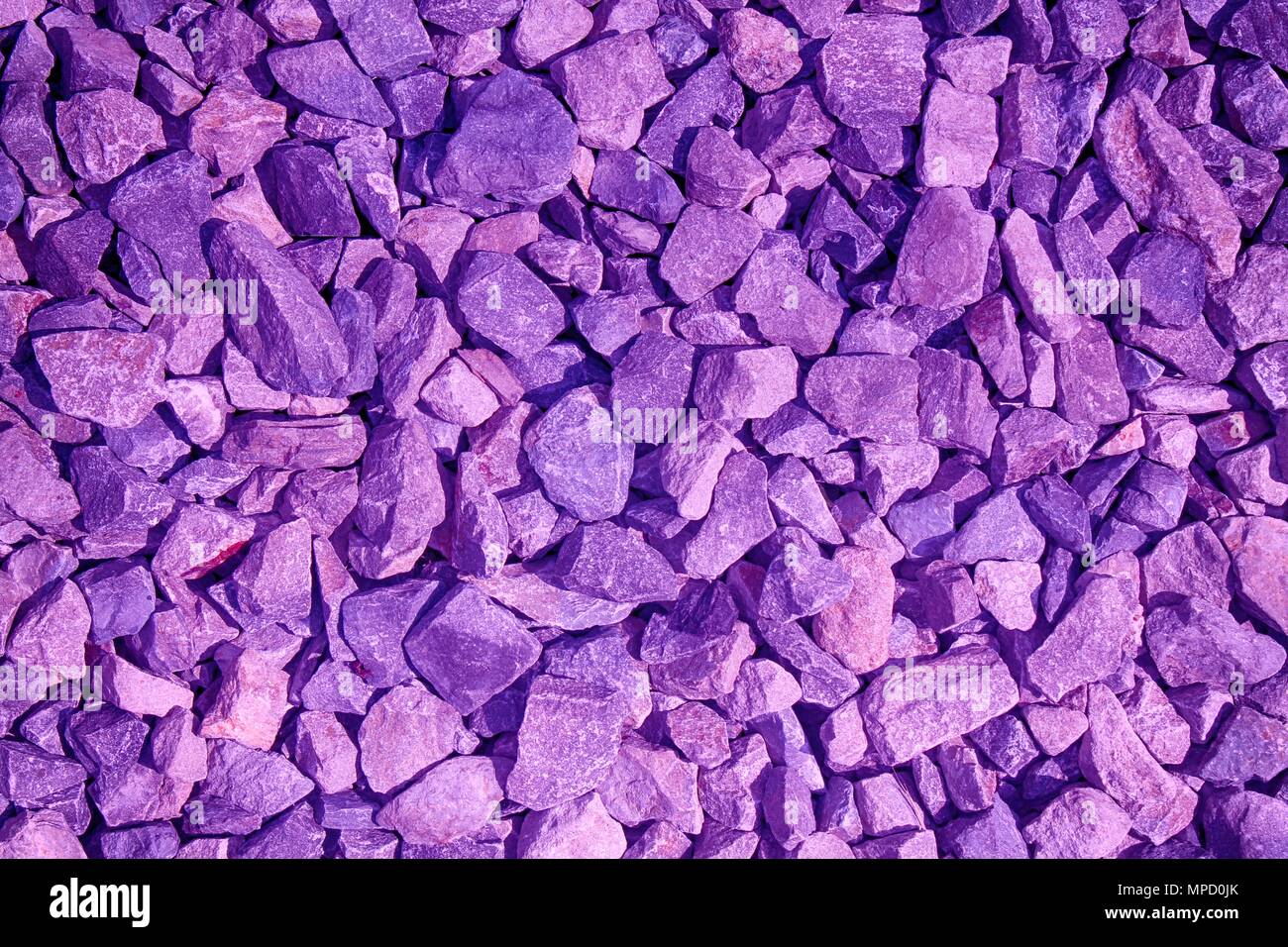 Ultra violet colored Pebble textured surface, stone backdrop and ...