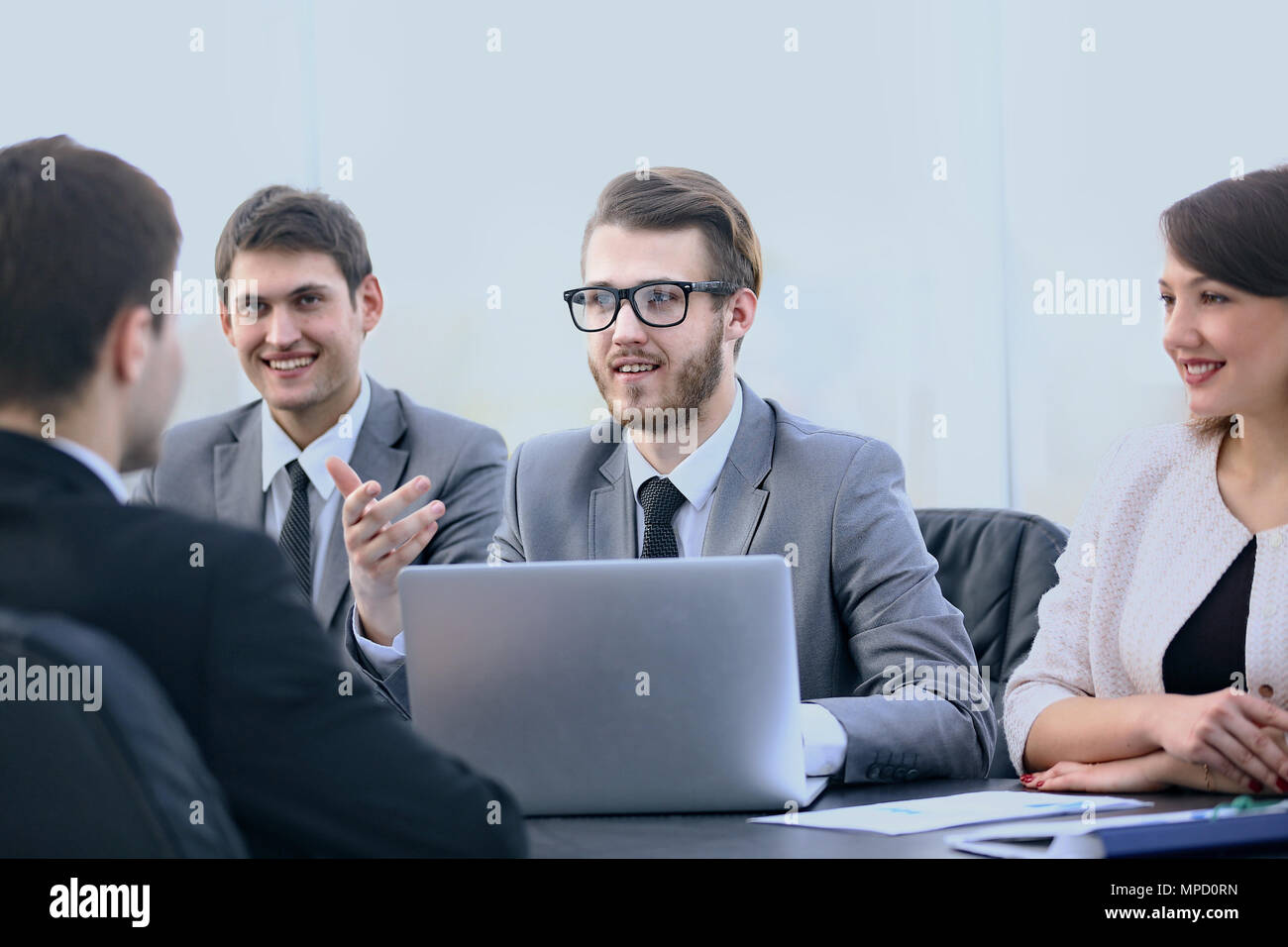 Manager communicates with the client in the office Stock Photo - Alamy