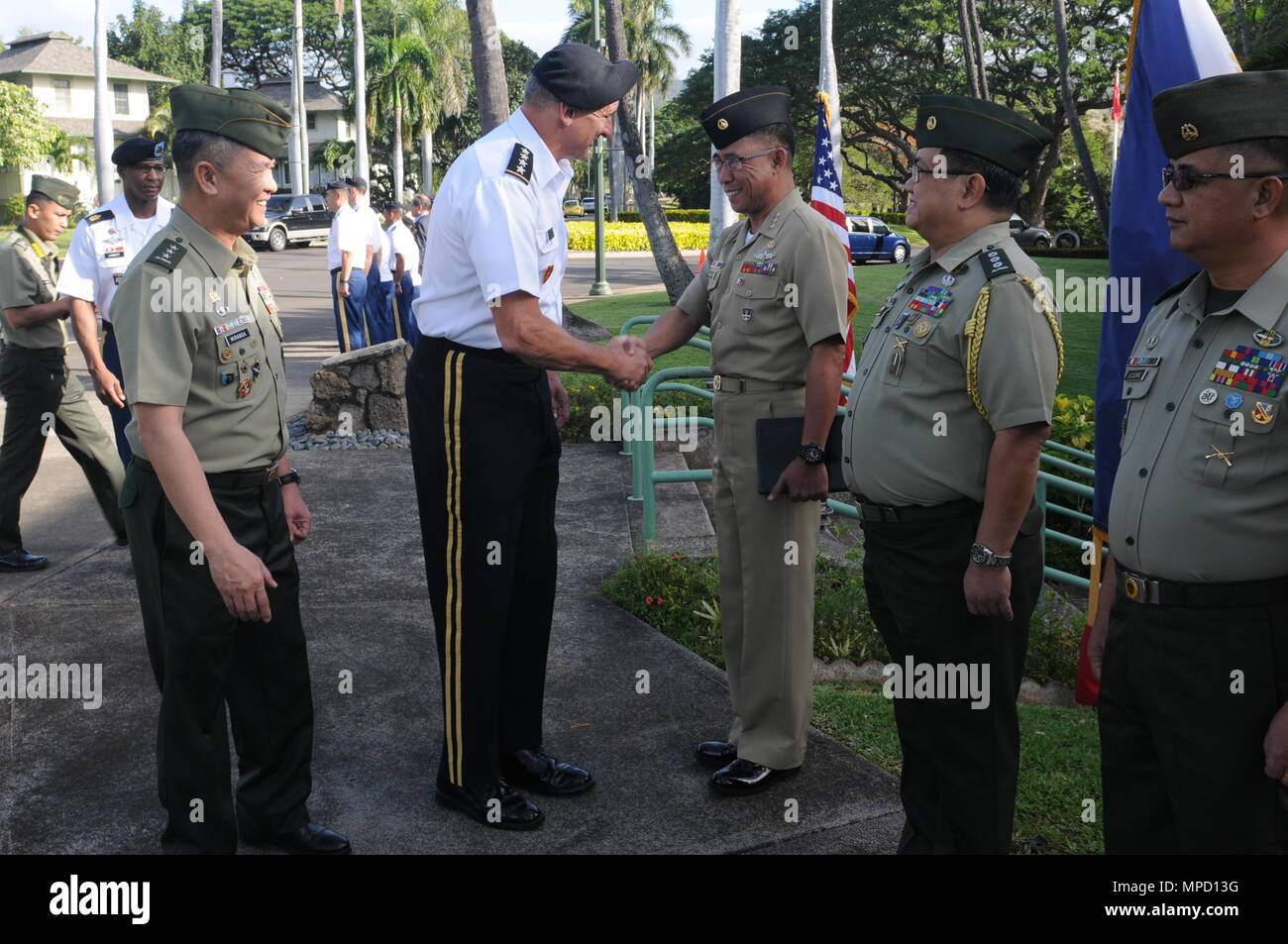 U.S. Army Pacific Commanding General, Gen. Robert Brown (center ...