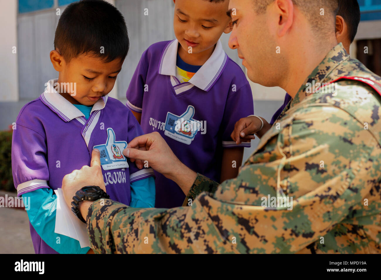U.S. Marine Corps Staff Sgt. Nathan Sotelo, a production specialist ...