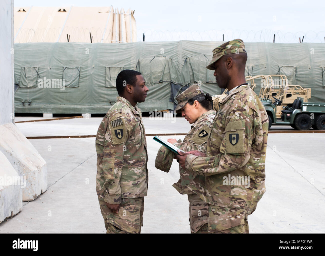 U.S. Army Sgt. 1st Class Mirna Velez, center, 28th Combat Support ...