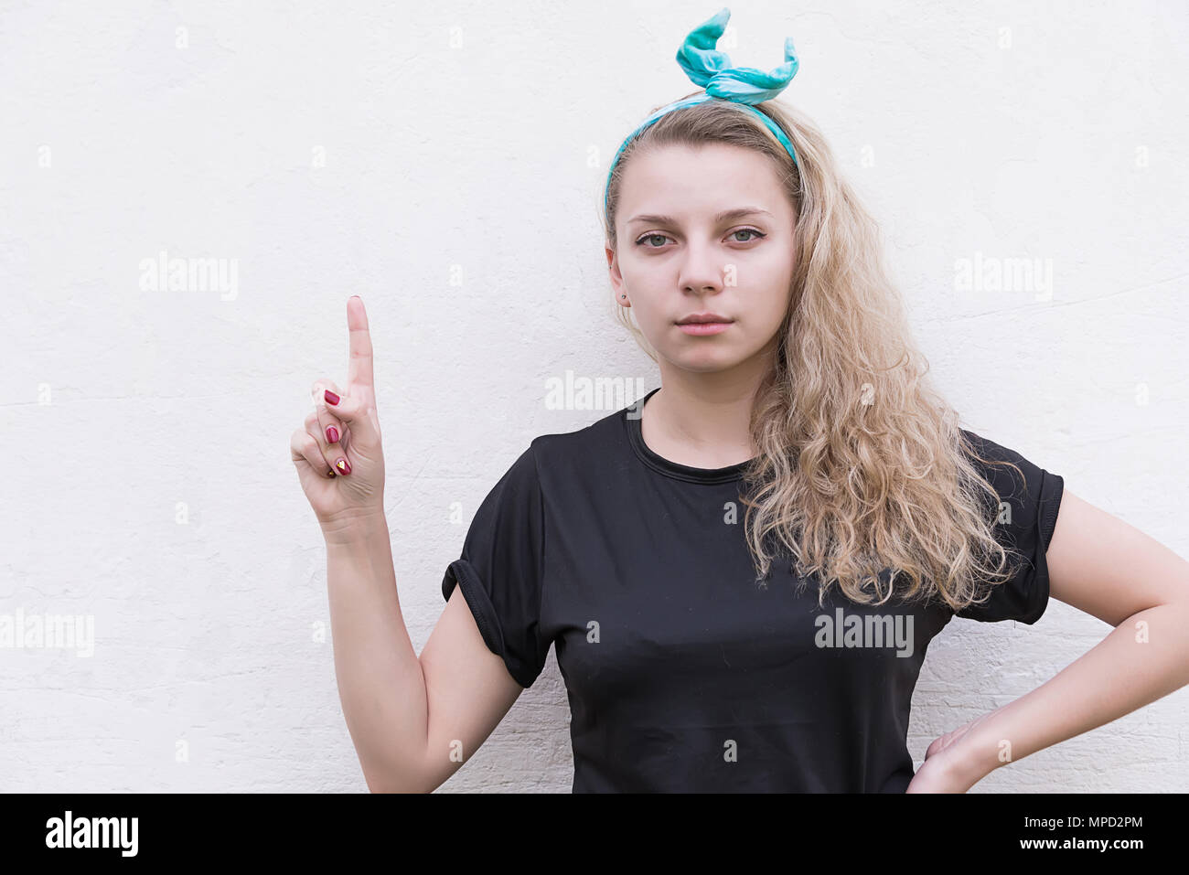 Female hand shows finger hi-res stock photography and images - Alamy