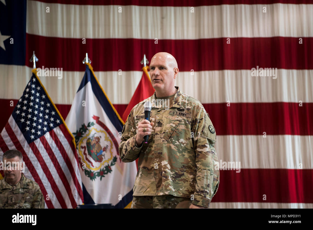 Incoming state Command Sgt. Maj. James L. Allen addresses the audience ...