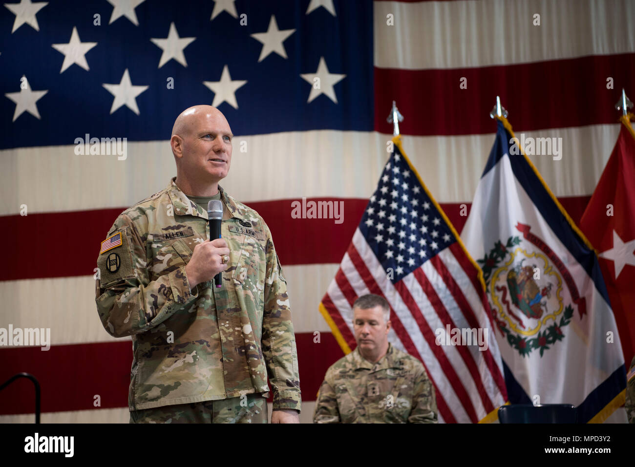 Incoming state Command Sgt. Maj. James L. Allen addresses the audience ...