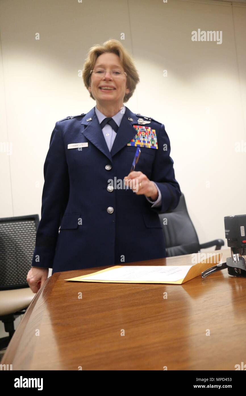 Brig. Gen. Carol Timmons signs her oath as the Adjutant General for the ...
