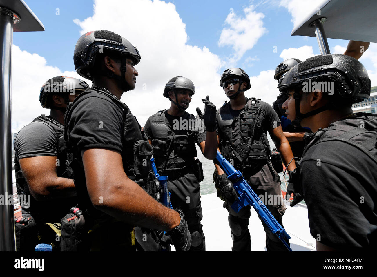 Mauritius National Coast Guard Commandos discuss boarding techniques ...