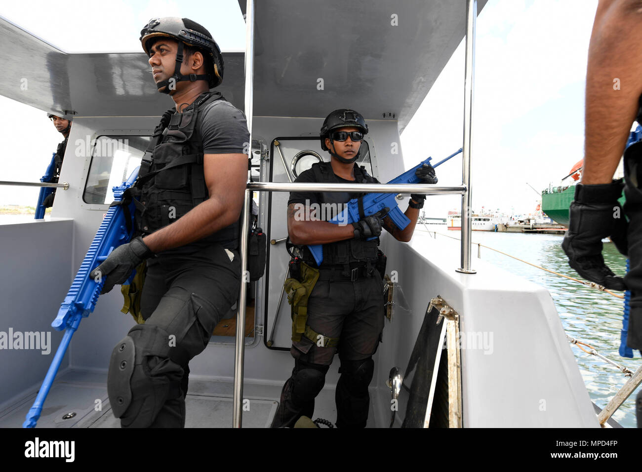 Mauritius National Coast Guard Commandos prepare to board the FNS Le ...