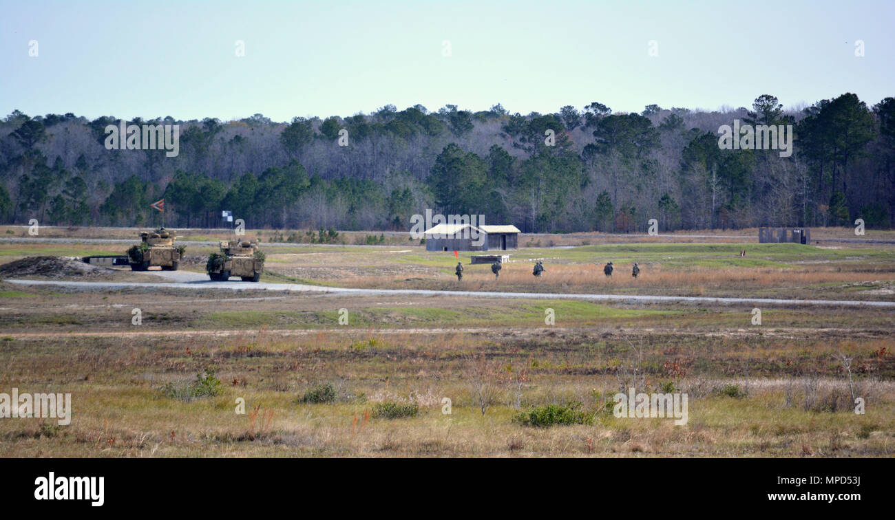 Soldiers from Company C, 2nd Battalion, 7th Infantry Regiment dismount ...