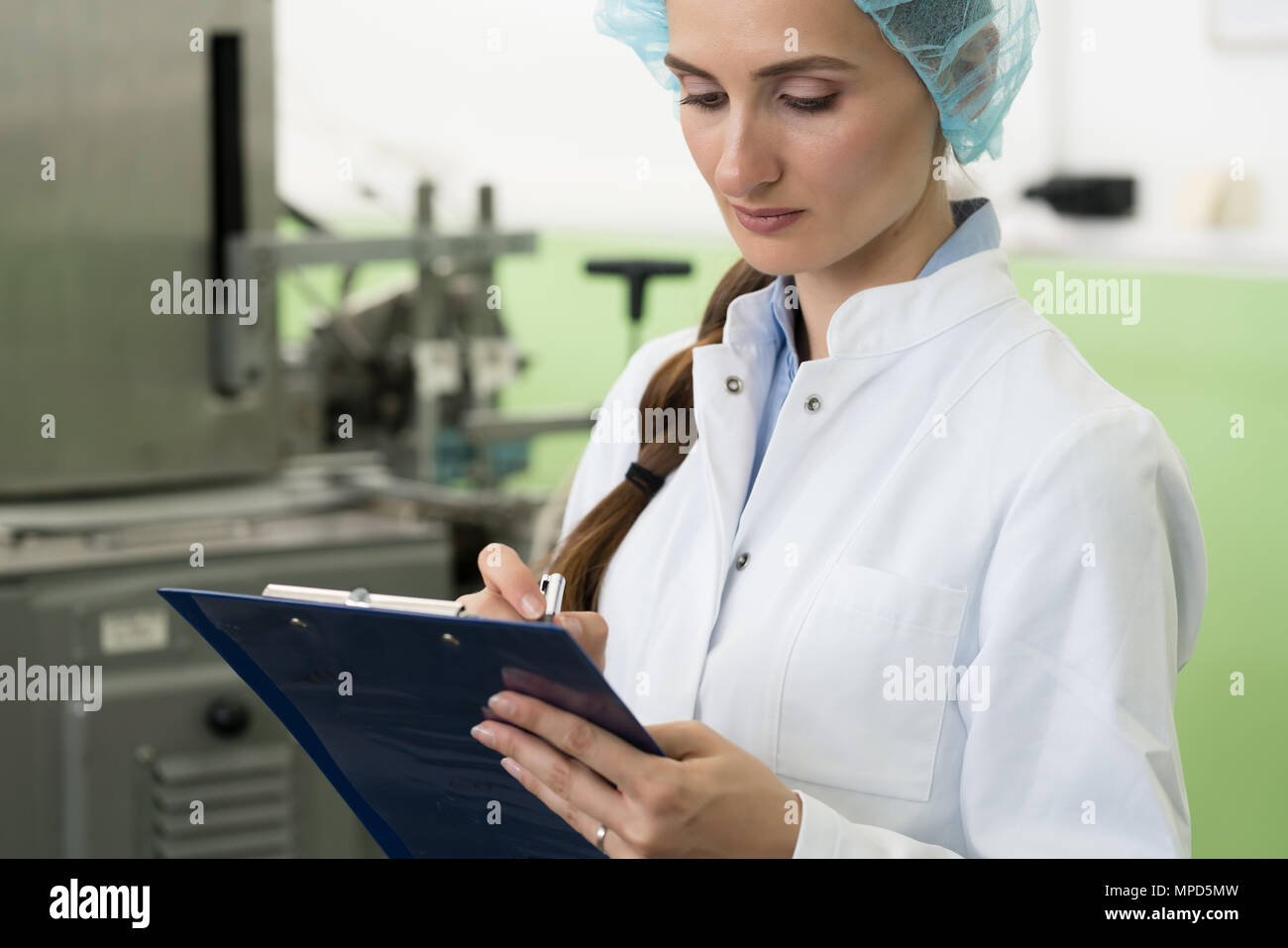 Quality control factory hi-res stock photography and images - Alamy