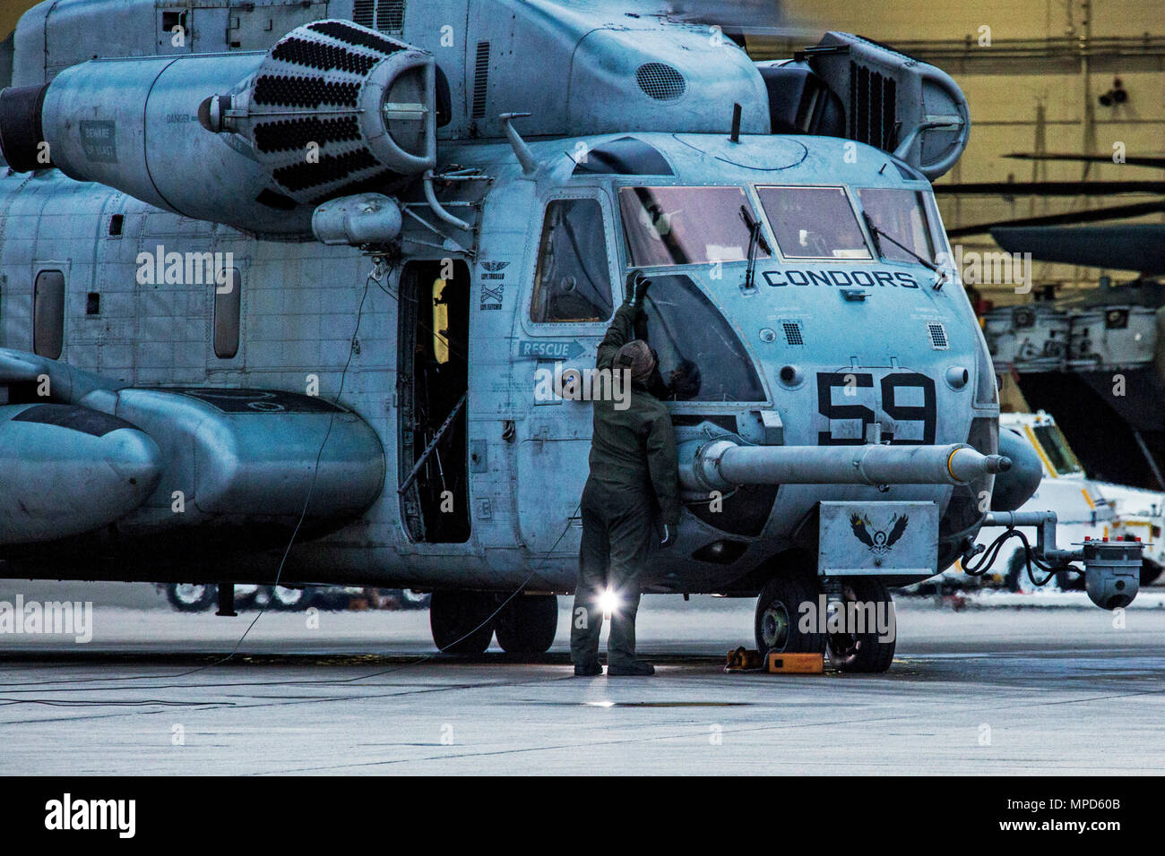 U.S. Marines with Marine Heavy Helicopter Squadron 464 prepare for a ...