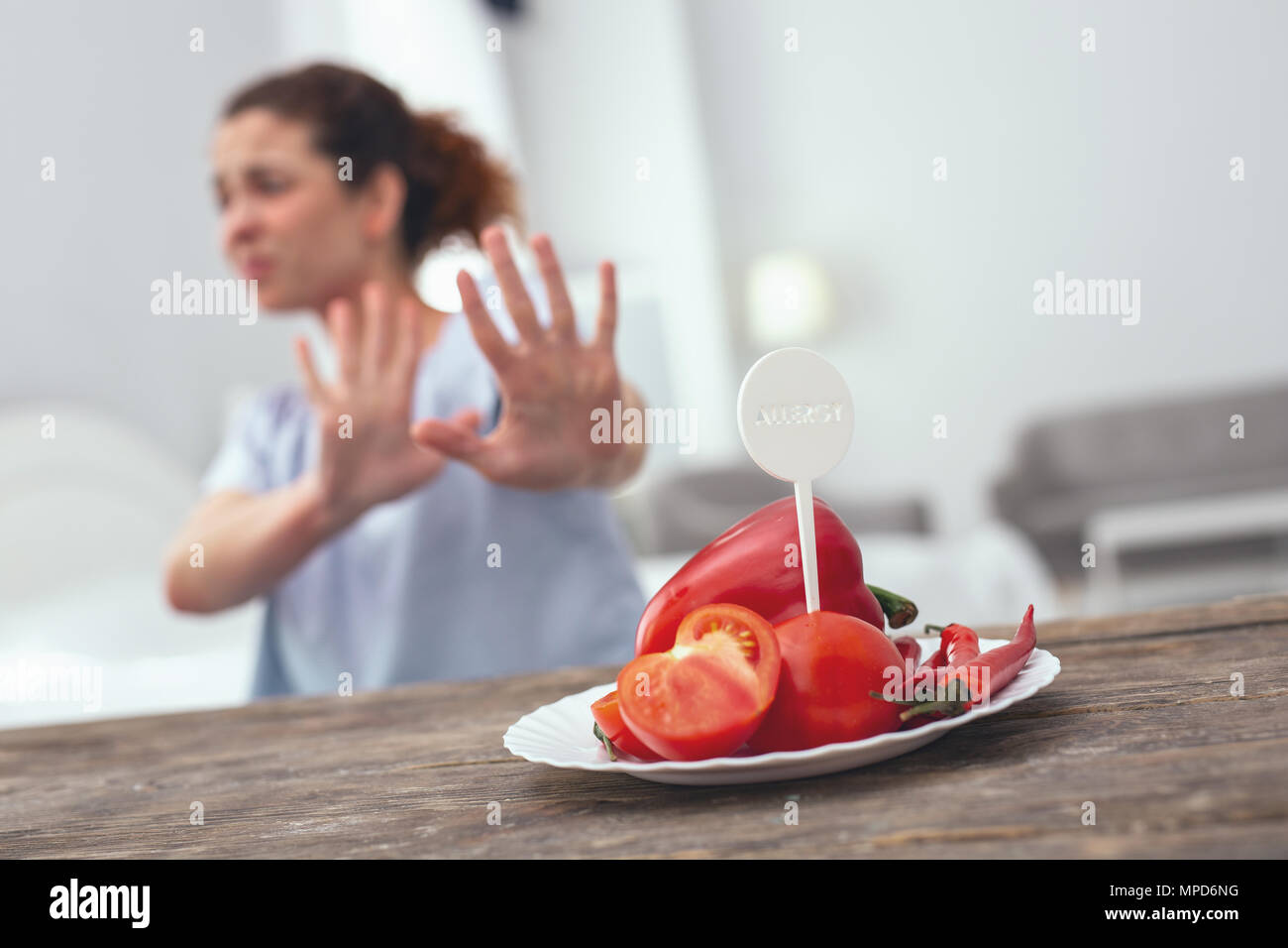 Young lady restricting herself in vegetables Stock Photo - Alamy
