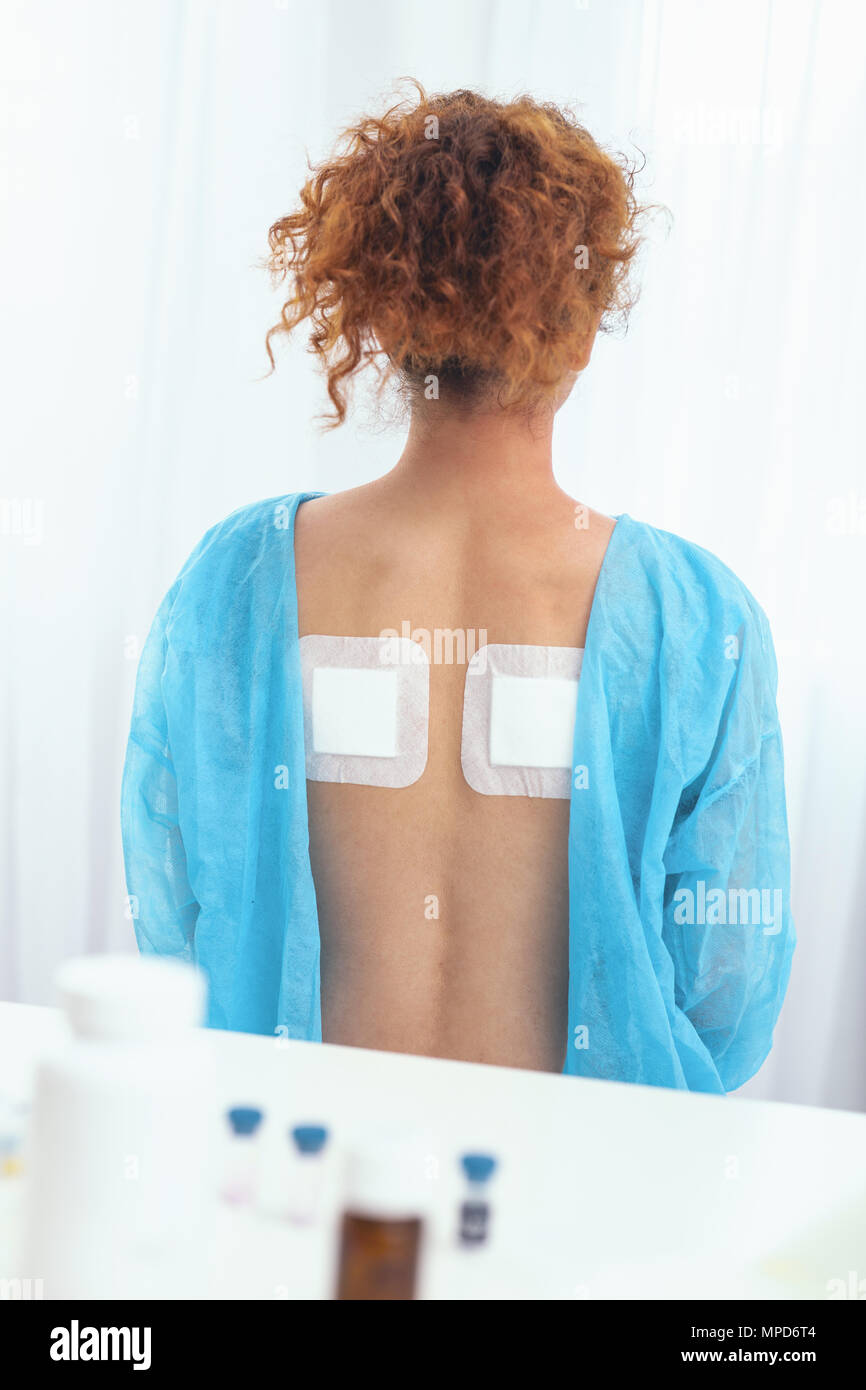 Young female patient getting muscle pain treatment Stock Photo - Alamy