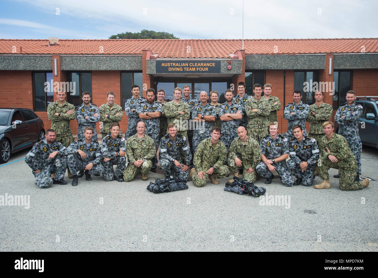 Service members assigned to Explosive Ordnance Disposal Mobile Unit ...