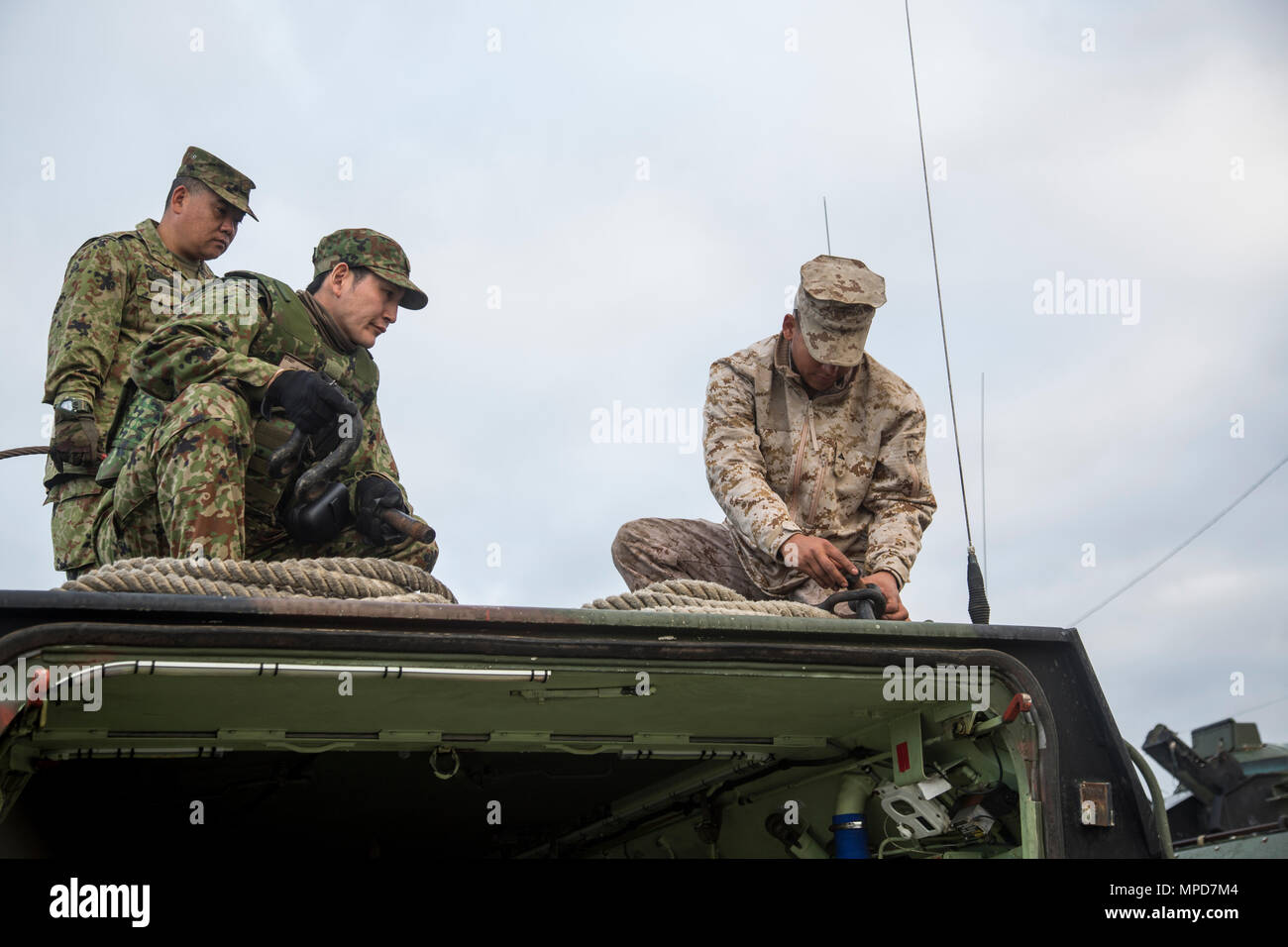 U.S. Marine Lance Cpl. William Rivera, an Assault Amphibious Vehicle ...