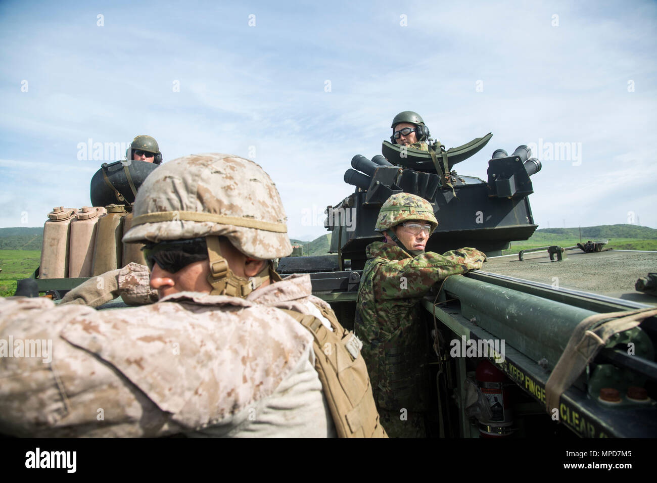 U.S. Marine Lance Cpl. William Rivera, an Assault Amphibious Vehicle ...