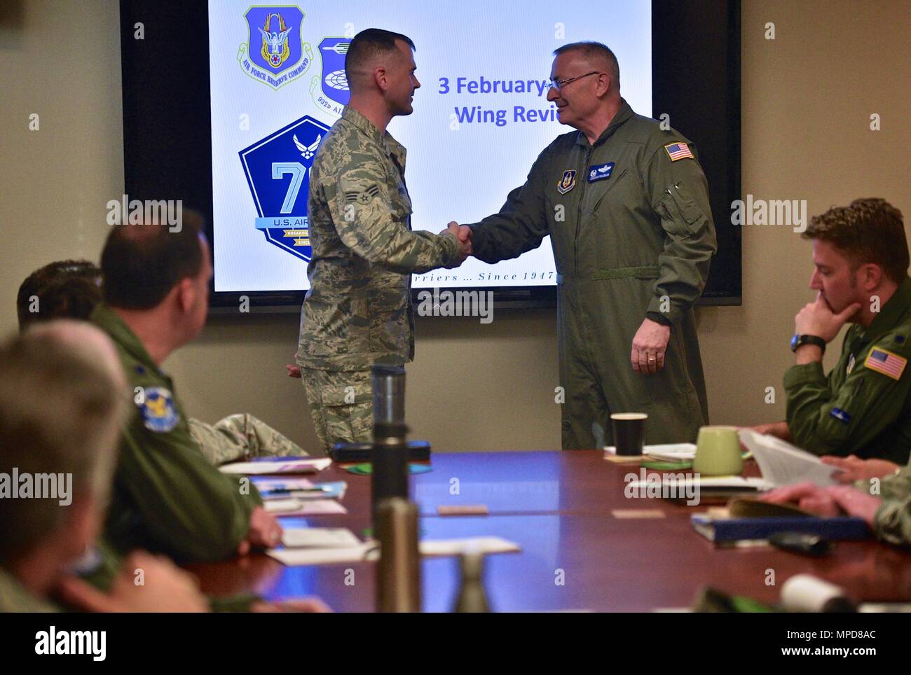 Col. Jonathan Philebaum, commander, 932nd Airlift Wing, presents Senior ...