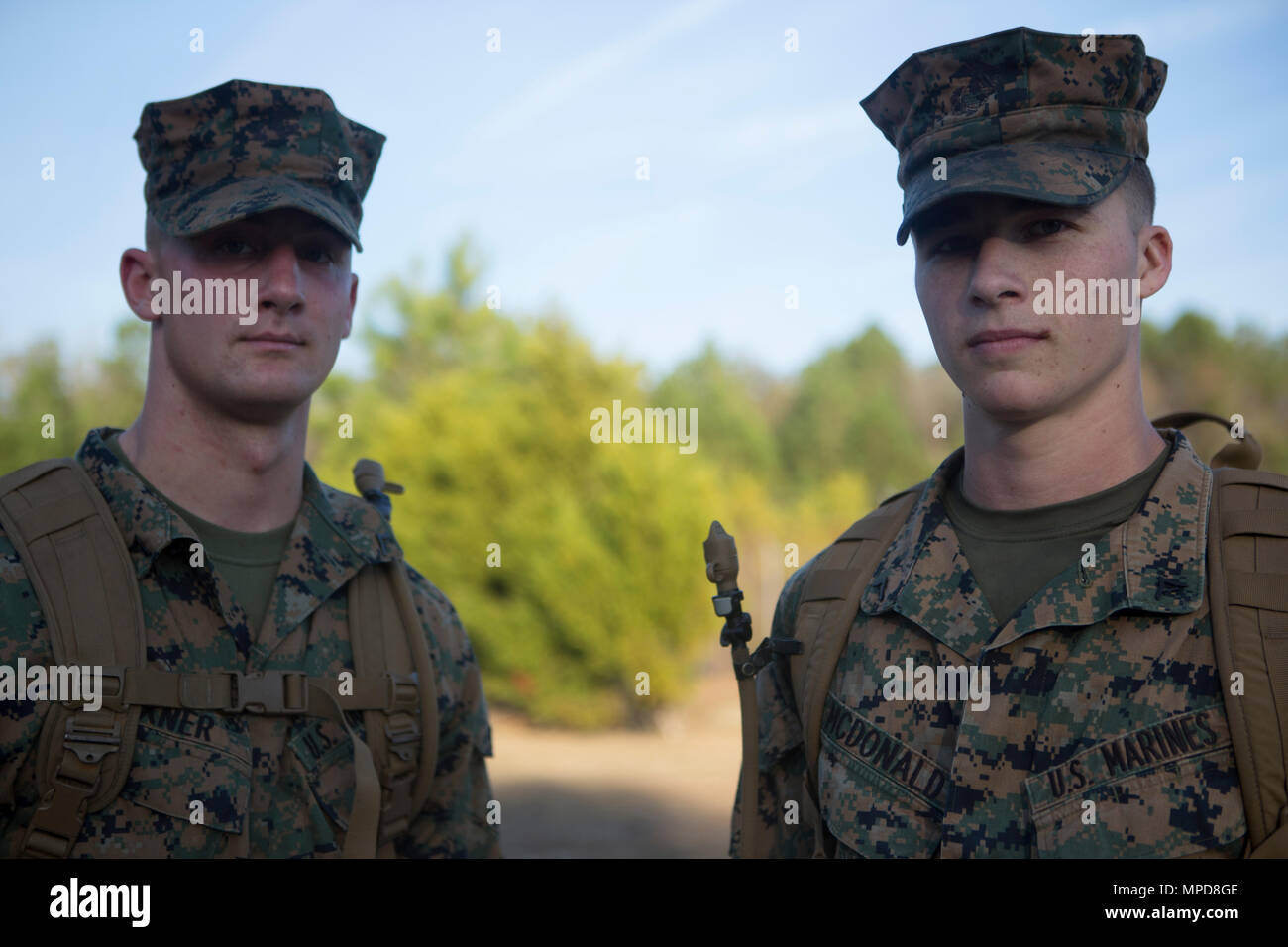 U.S. Marine Corps Lance Cpl. Austin L. Exner, left, and Lance Cpl ...