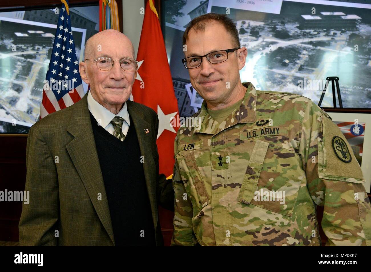 Maj. Gen. (Retired) Floyd Baker, M.D. (r) and Maj. Gen. Brian Lein, commanding general, U.S ...