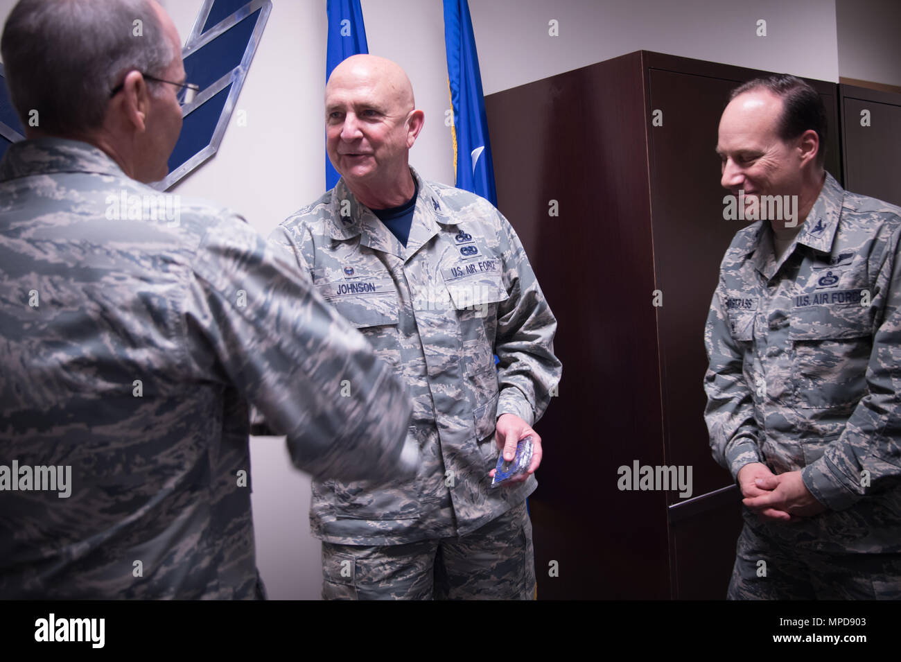 Col. Jay Johnson, 403rd Maintenance Group commander, presents Maj. Gen ...