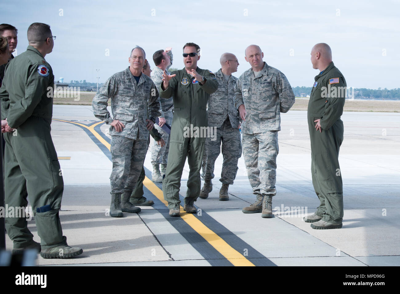Lt. Col. Sean Cross, 53rd Weather Reconnaissance Squadron pilot , speks ...