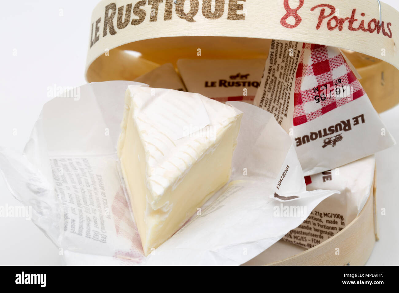 Le Rustique camembert made in Normandy France from cows milk divided ...