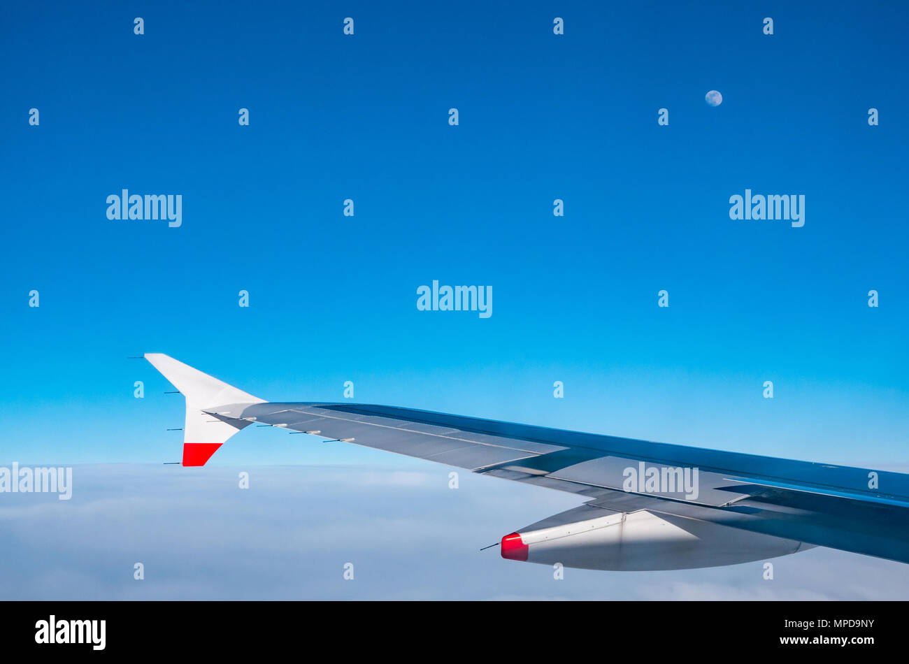 British Airways Airbus 319 plane wing sparkling in sunshine, seen from ...