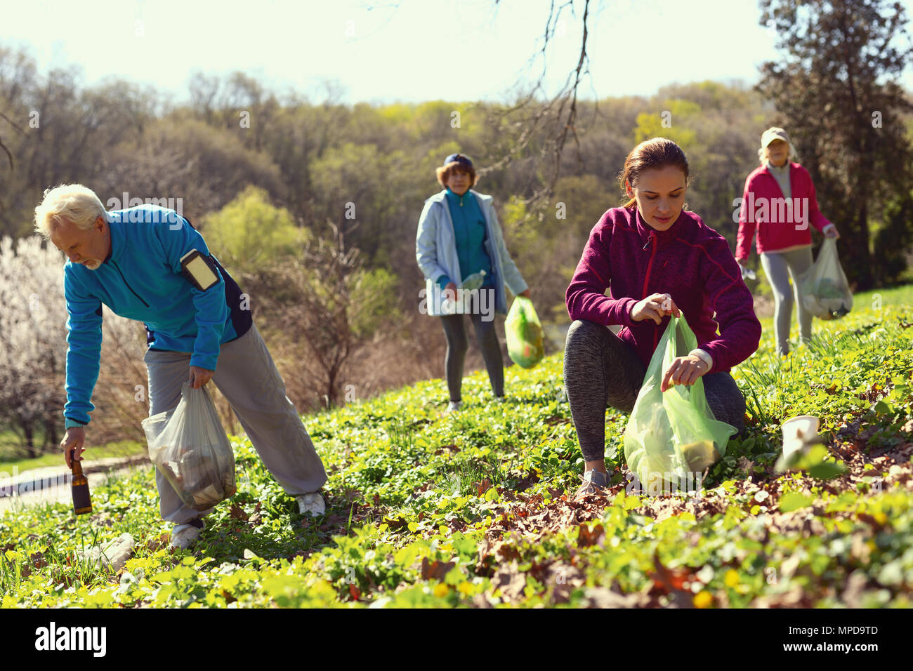 Gathering litter hi-res stock photography and images - Alamy