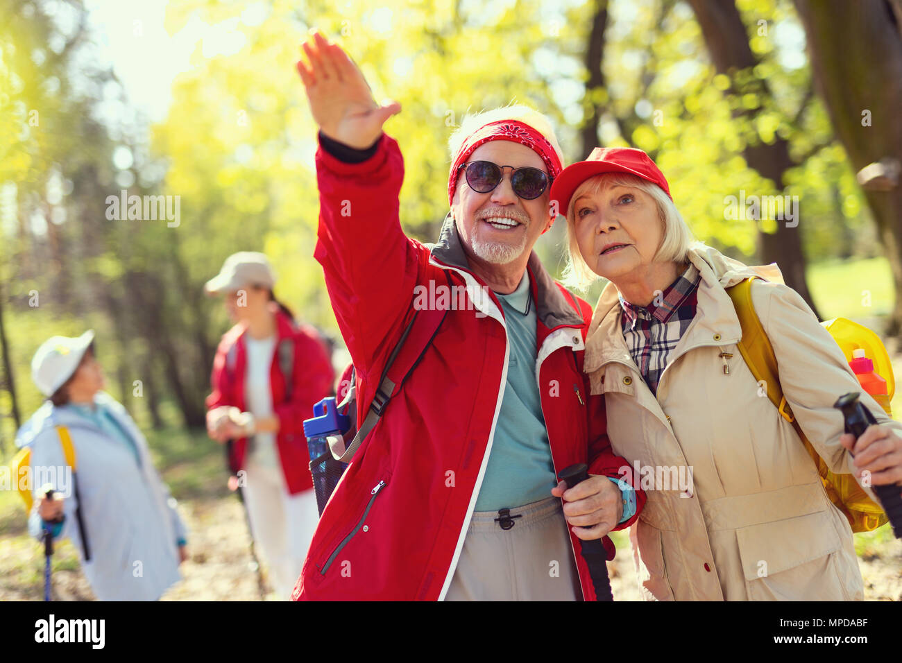 Happy man pointing at a bird Stock Photo - Alamy