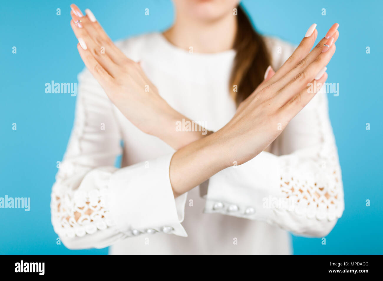 Young woman show stop hi-res stock photography and images - Alamy