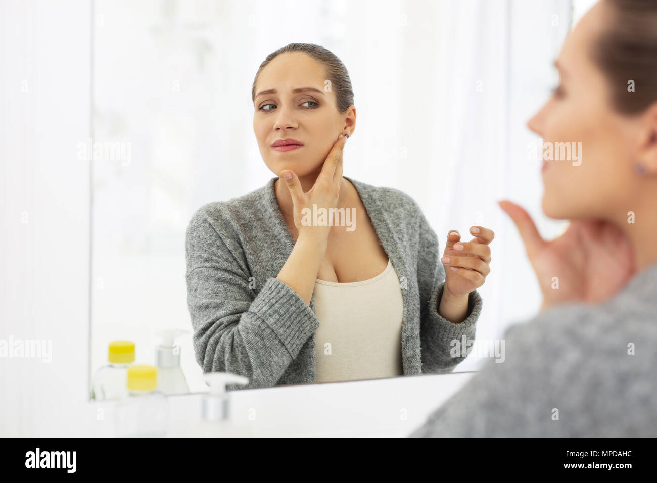 Discontented face hi-res stock photography and images - Alamy