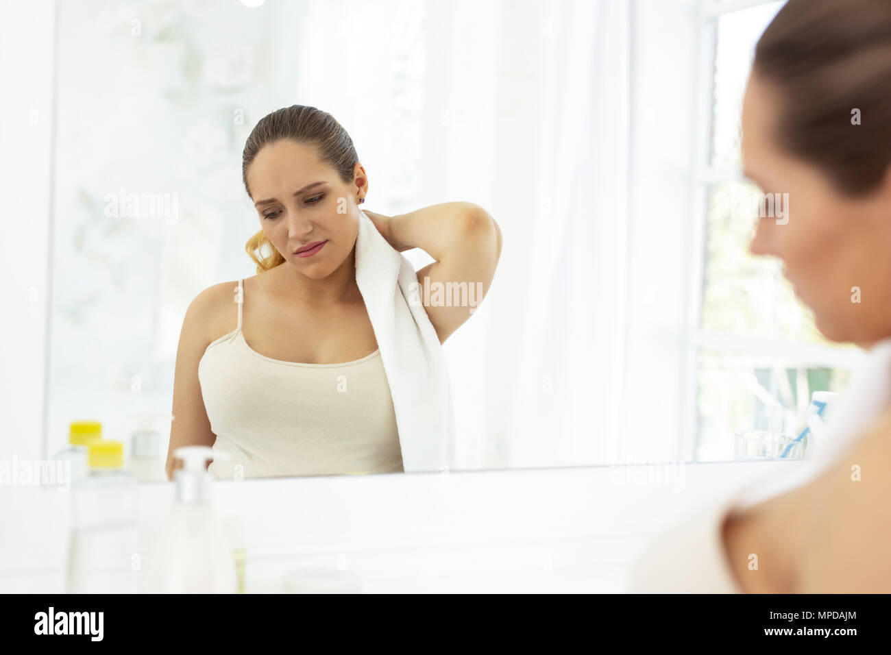 Sad upset woman suffering from discomfort Stock Photo - Alamy