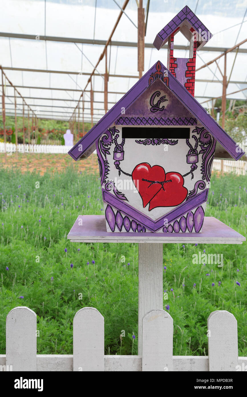 Colorful mail box at a lavender flower garden Stock Photo - Alamy