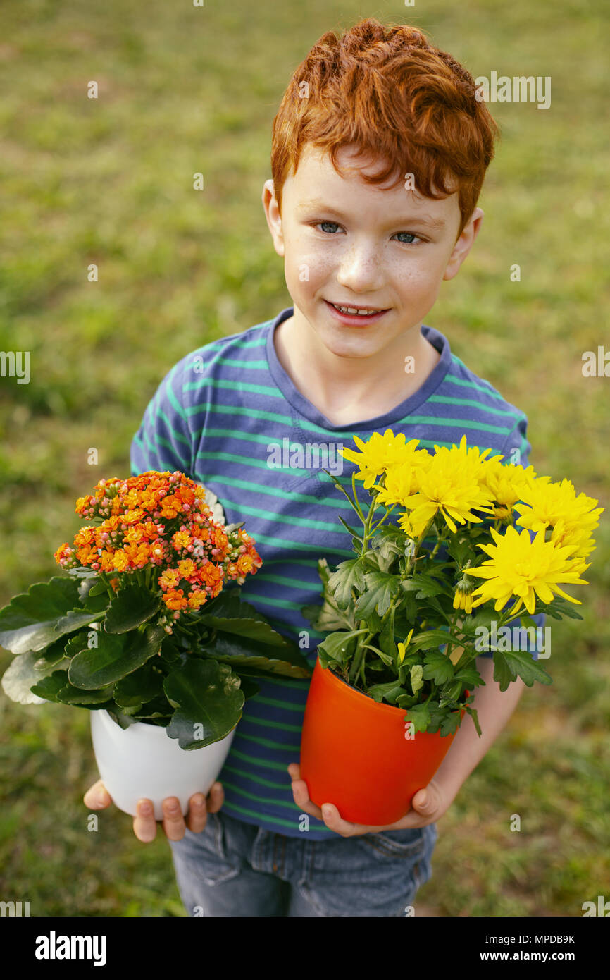 Cheerful nice boy smiling Stock Photo - Alamy