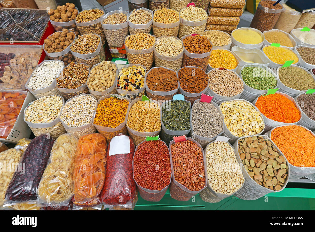 Dried Fruits and Nuts in Bulk Bags at Market Stock Photo - Alamy
