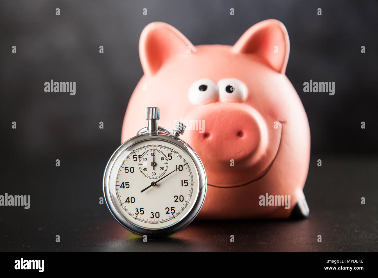 Analog stopwatch on black background Stock Photo - Alamy