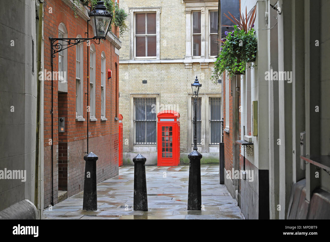 Traditional British Red Telephone Booth in Small Street Stock Photo - Alamy
