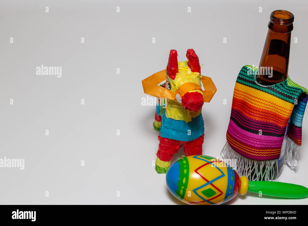 Beer having a Mexican fiesta on white background Stock Photo - Alamy