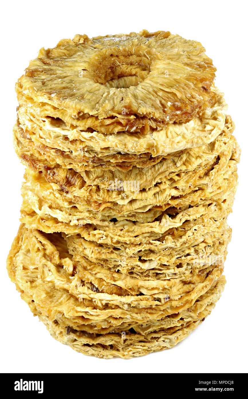 dried pineapple rings isolated on white background Stock Photo - Alamy